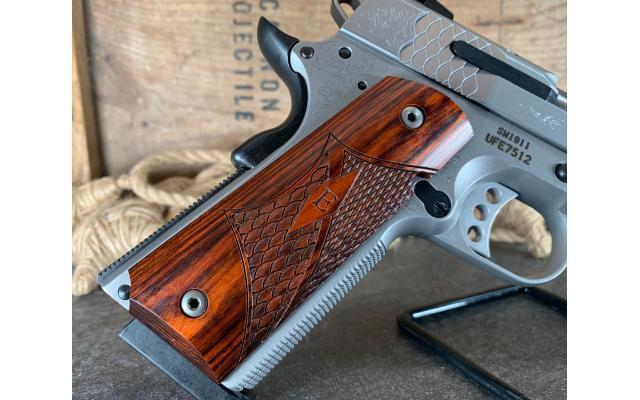 New Smith & Wesson SW1911 Engraved .45acp - harveysauctions.com