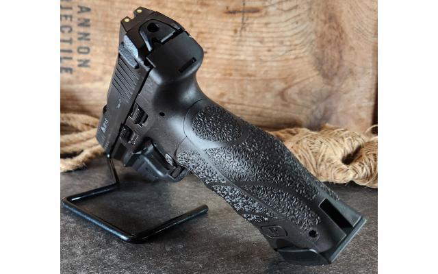 New Heckler & Koch VP9 With Crimson Trace Laser 9MM - harveysauctions.com