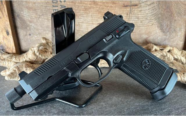 Pre-owned FNH FNX-45 Tactical .45acp In Box - harveysauctions.com